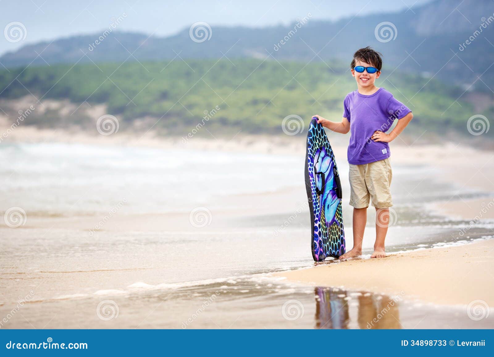 Little boy with surf board stock image. Image of seaside - 34898733