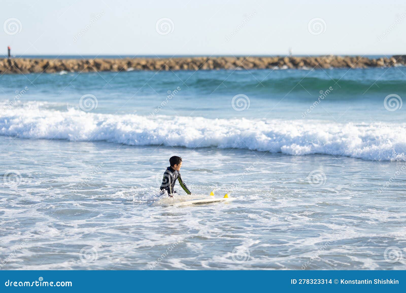 A Little Boy Surfer in the Sea Stock Photo - Image of child, activity ...