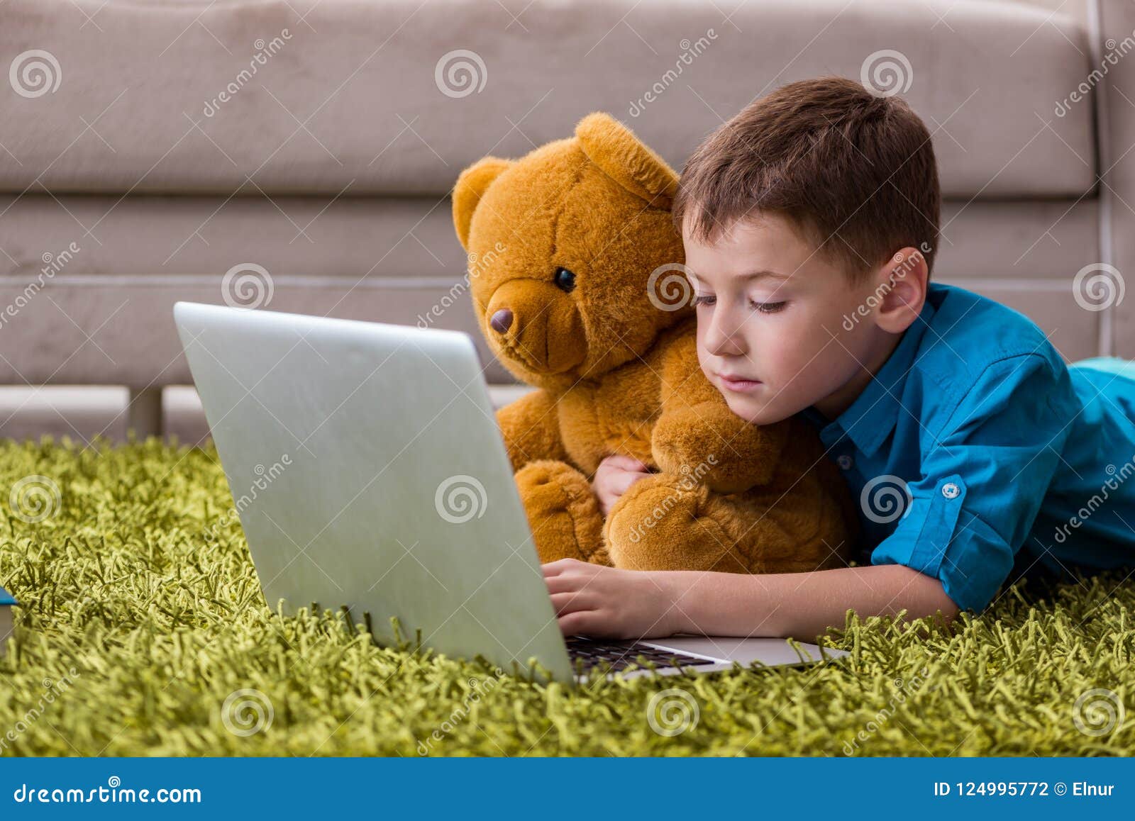 The Little Boy Surfing Internet on Laptop Stock Photo - Image of ...
