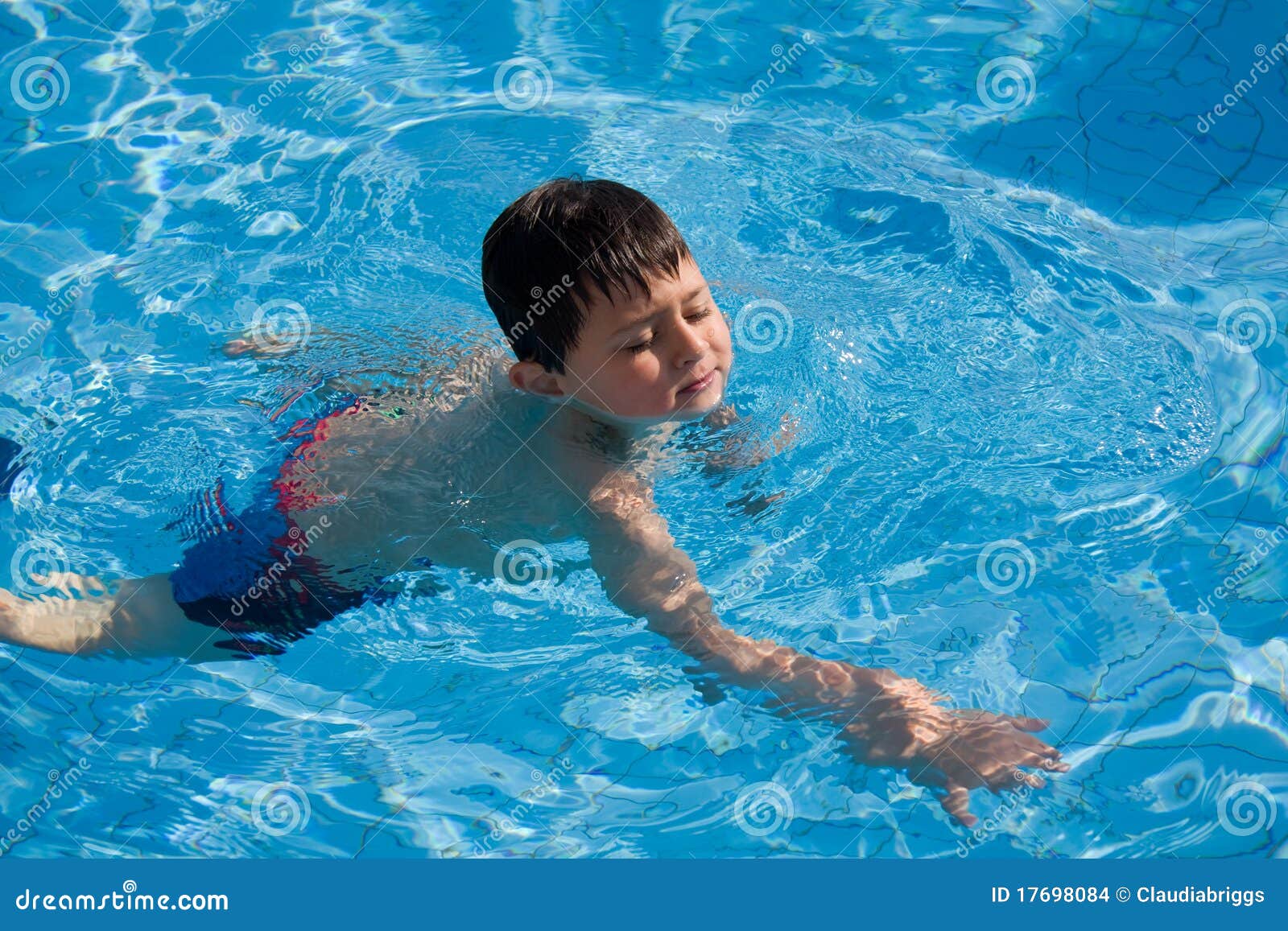 Little Boy Swimming stock photo. Image of blue, water - 17698084