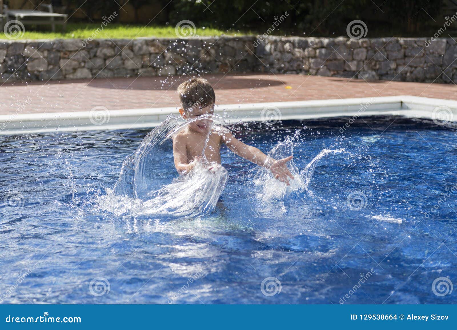 Little boy in pool stock photo. Image of happiness, cool - 129538664