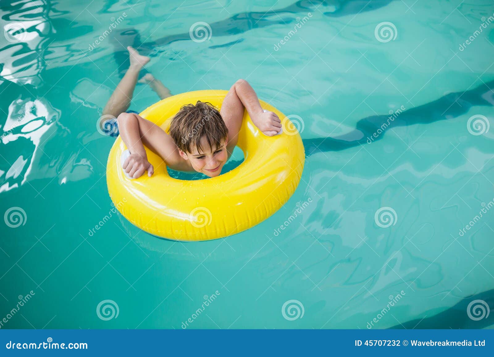 Little Boy Swimming with Rubber Ring Stock Photo - Image of water ...