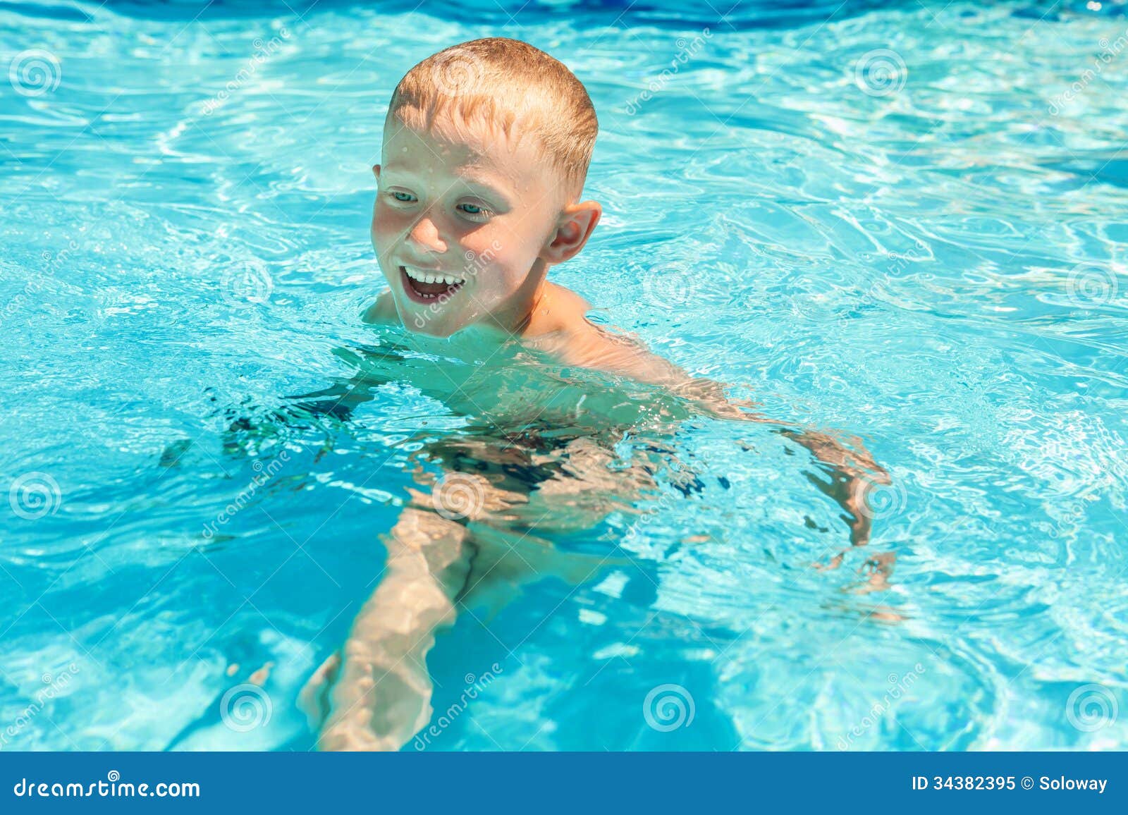 Little boy swims in pool stock image. Image of cheerful - 34382395
