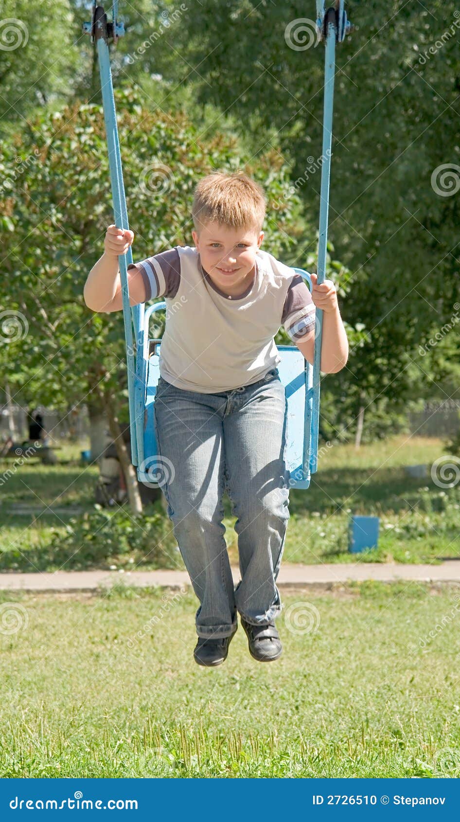 Little boy on a swing stock photo. Image of child, caucasian - 2726510