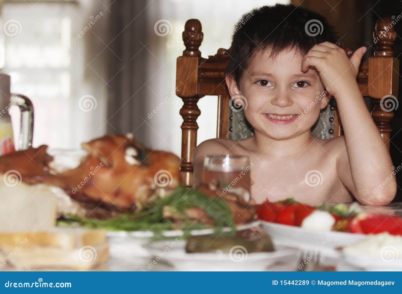 Little boy at table stock image. Image of dinner, focus - 15442289