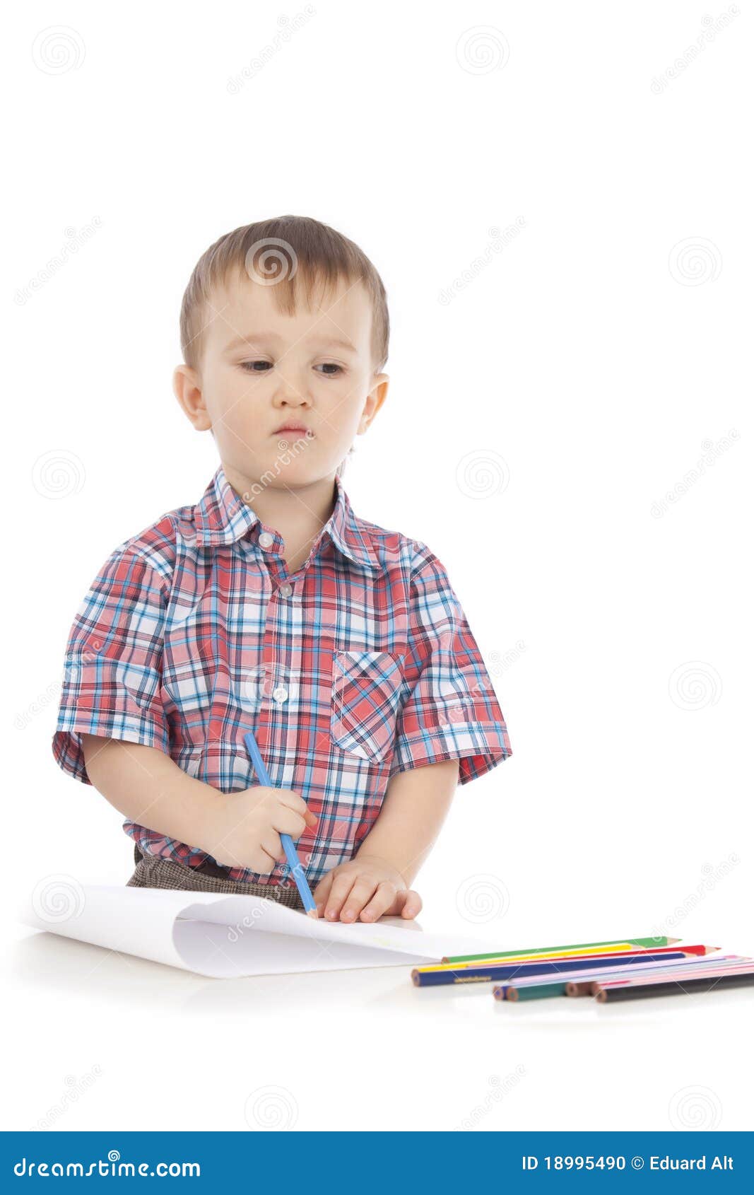 A Little Boy at the Table Draws Stock Photo - Image of color, pencil ...