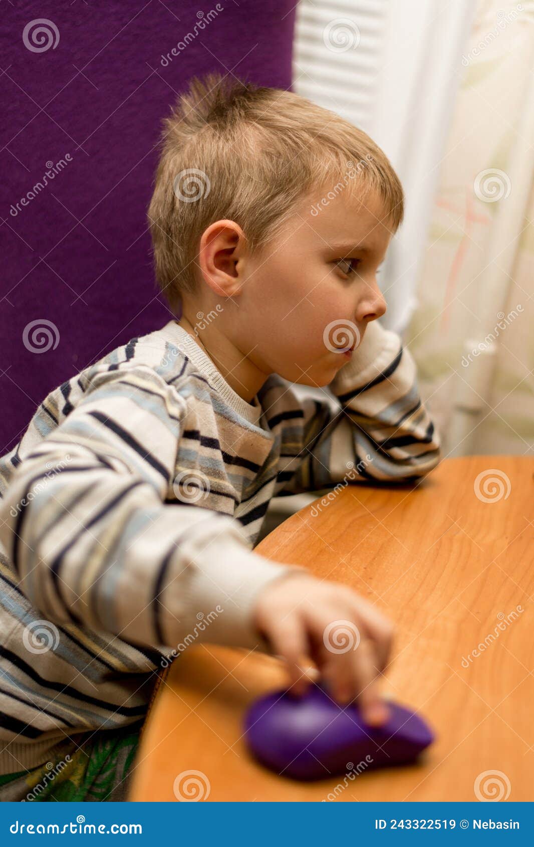 Little Boy at the Table in Front of the Computer Stock Image - Image of ...