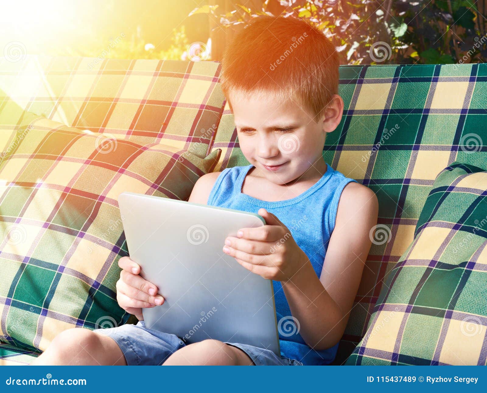 Little boy with tablet pc stock image. Image of personal - 115437489