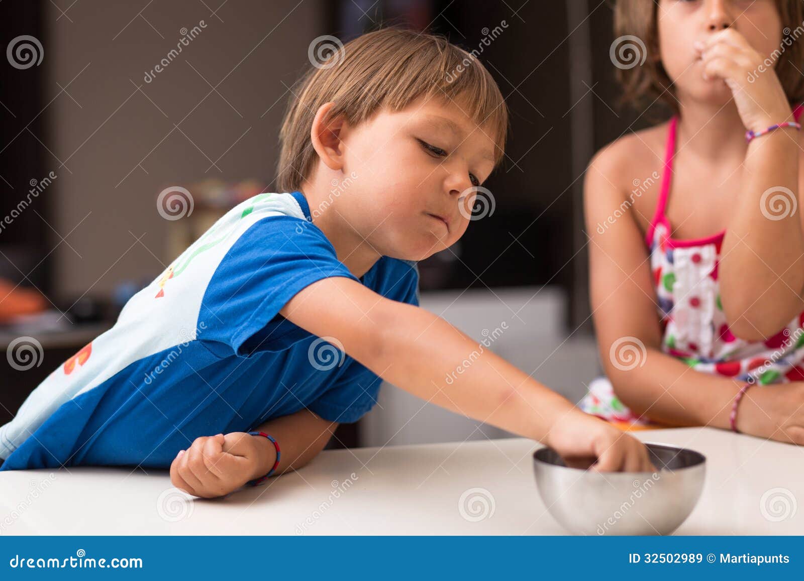 Little Boy Taking Candy from a Bowl Stock Image - Image of cook ...