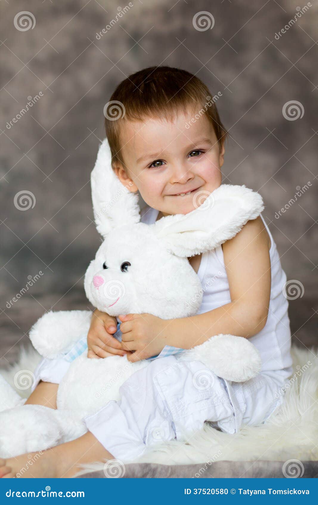 Little Boy with Teddy Rabbit Stock Photo - Image of caucasian, soft ...