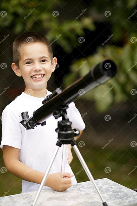 Little boy with telescope stock photo. Image of explorer - 28808276