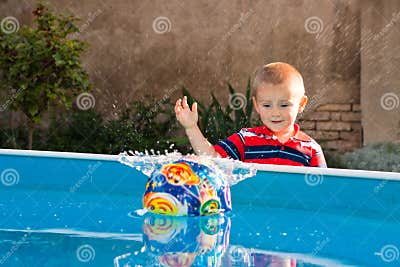 Little boy throw ball stock photo. Image of garden, face - 22120806
