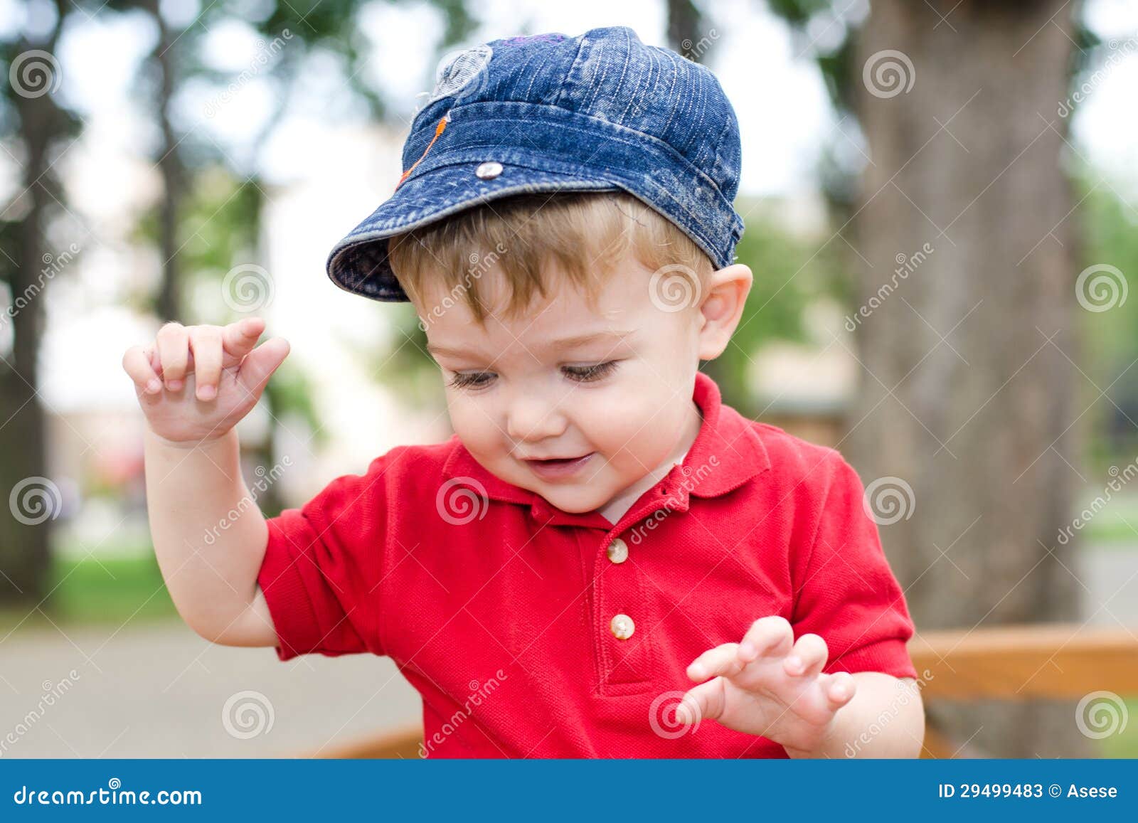 Little boy throwing a rock stock image. Image of park - 29499483