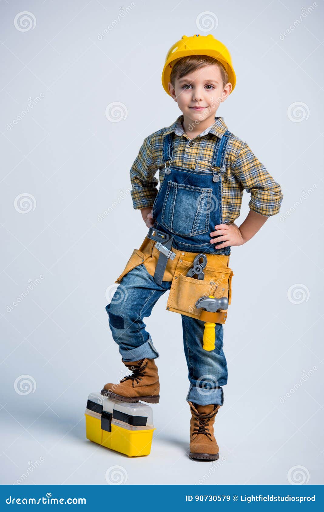 Little boy in tool belt stock image. Image of occupation - 90730579