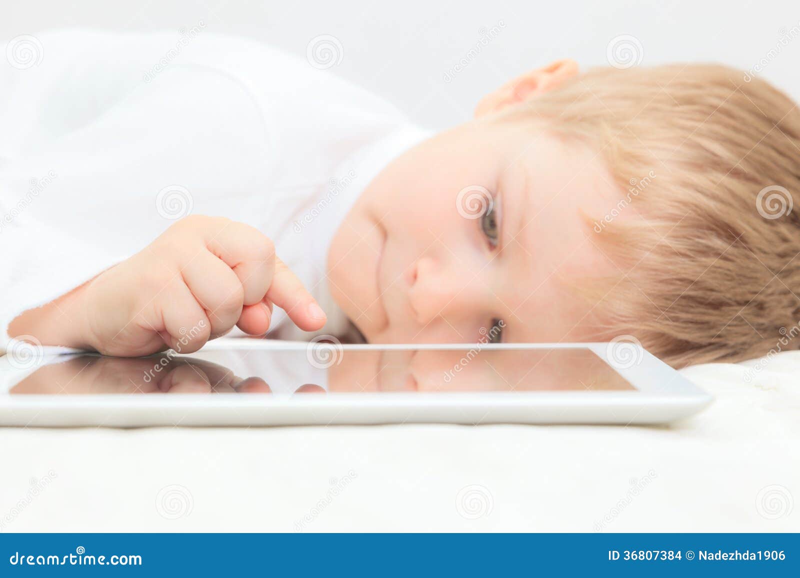 Little boy with touch pad stock photo. Image of modern - 36807384
