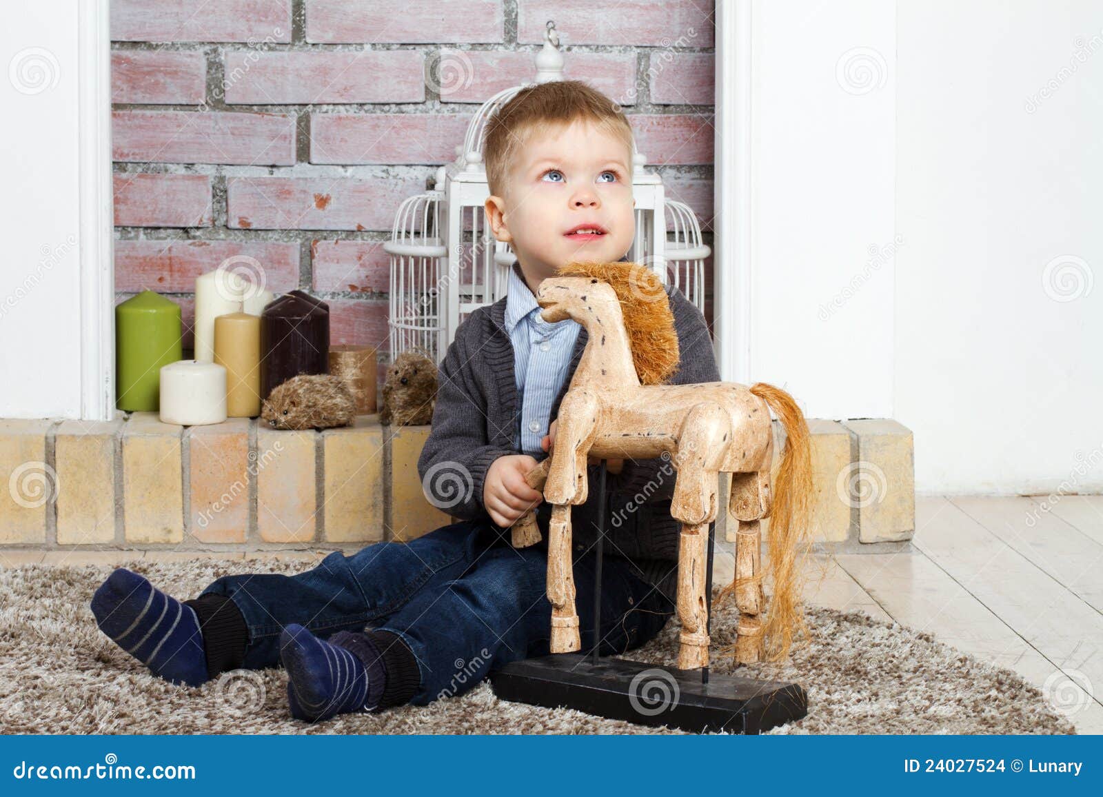 Little boy and toy stock photo. Image of look, little - 24027524