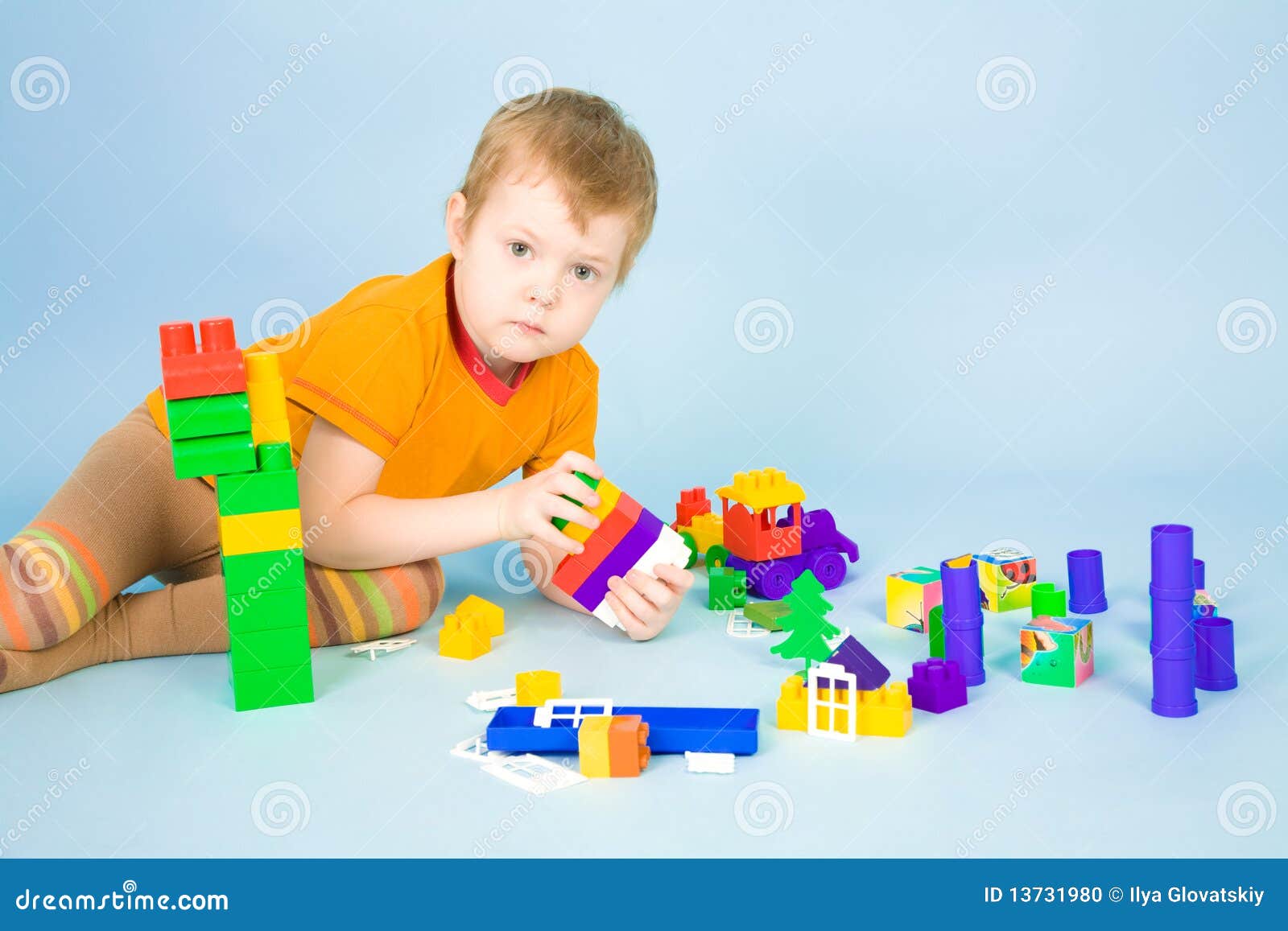 Little boy with toys stock photo. Image of block, building - 13731980