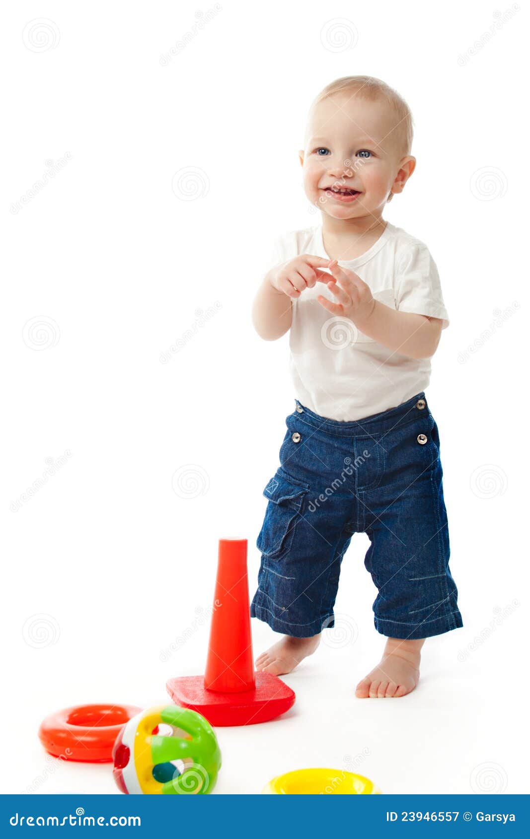 Little boy with toys stock image. Image of jeans, toddler - 23946557