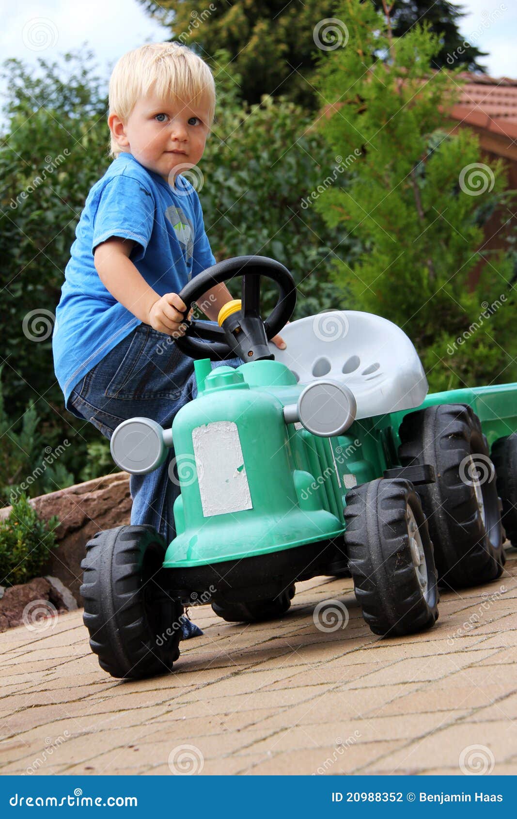 Little boy with tractor stock photo. Image of industrial - 20988352