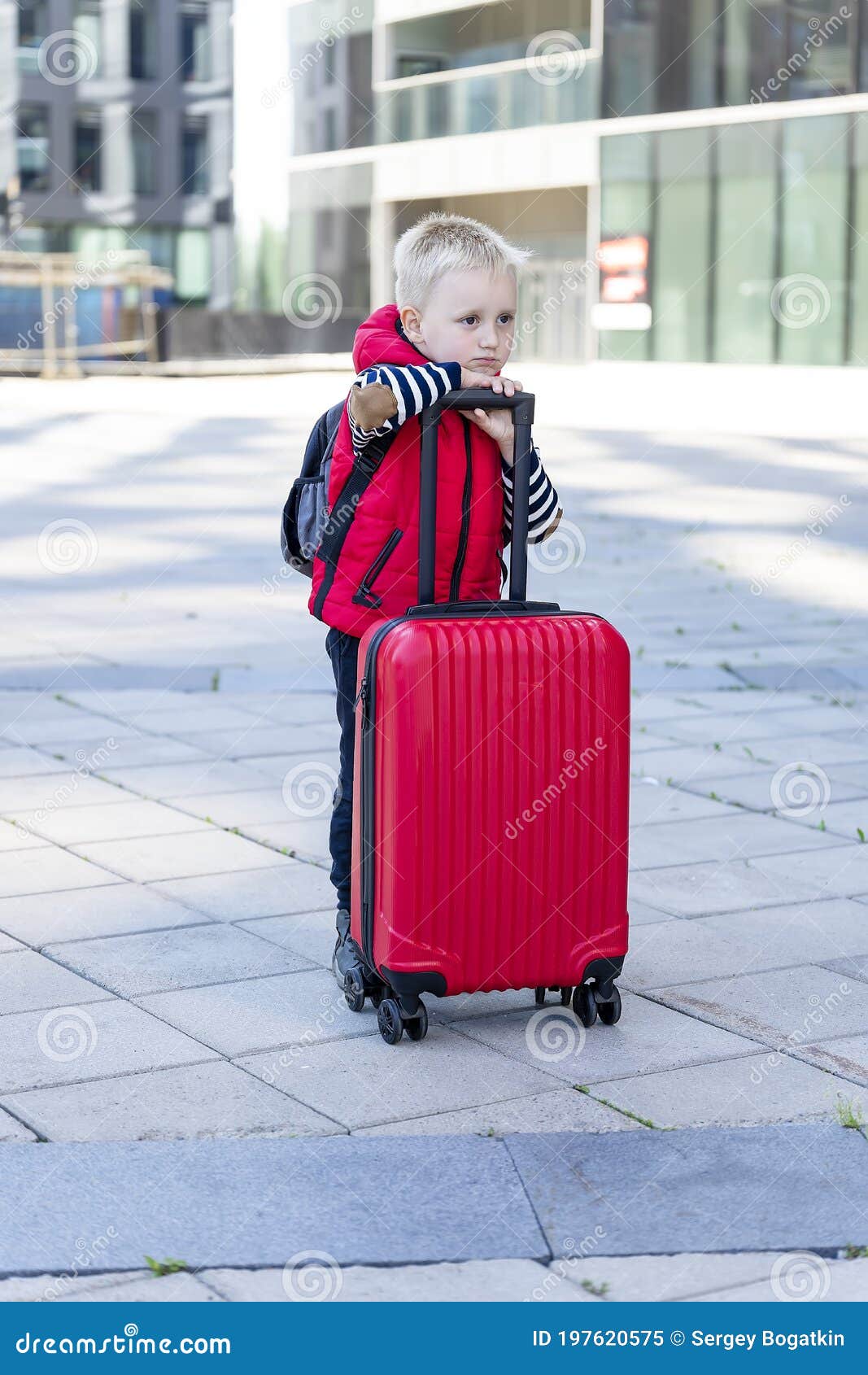 Little Boy Traveler on the Background of Modern Buildings Stock Image ...