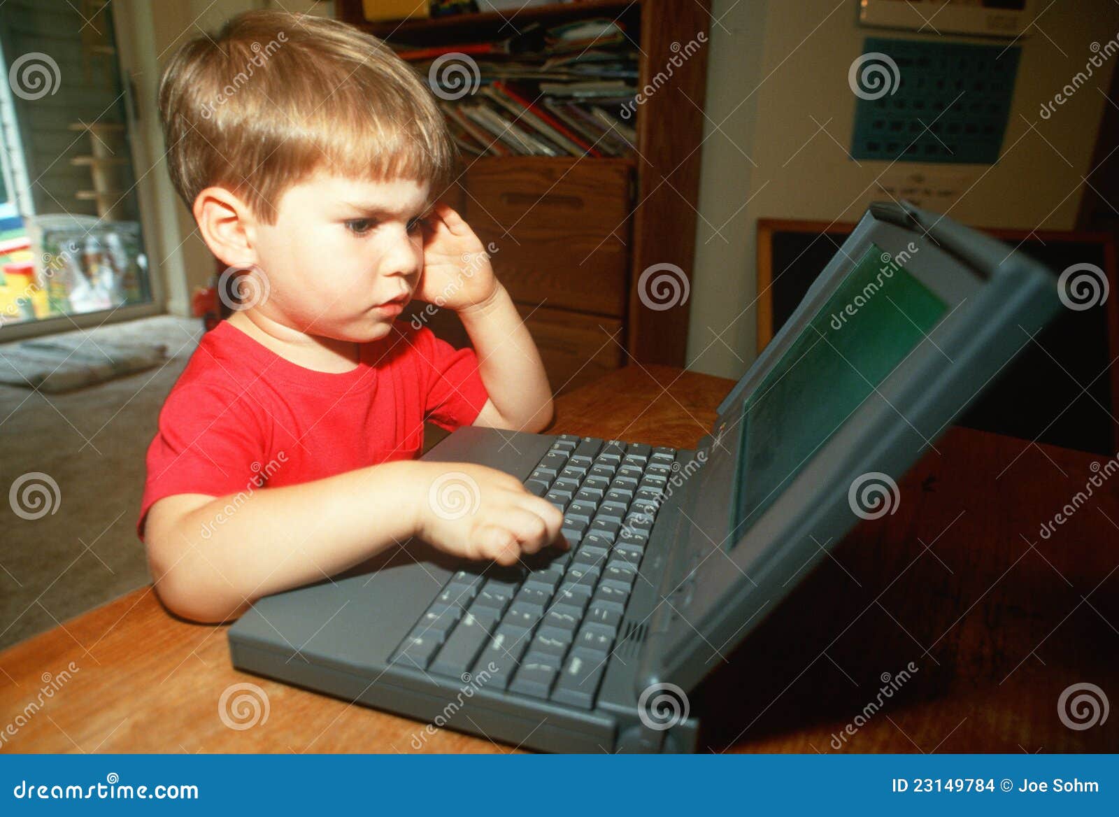 Little Boy Trying To Work on Laptop Computer Editorial Stock Image ...