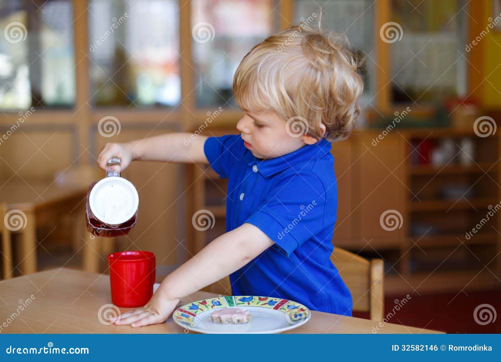 Little Boy of Two Years Having Breakfast at Nursery Stock Photo - Image ...