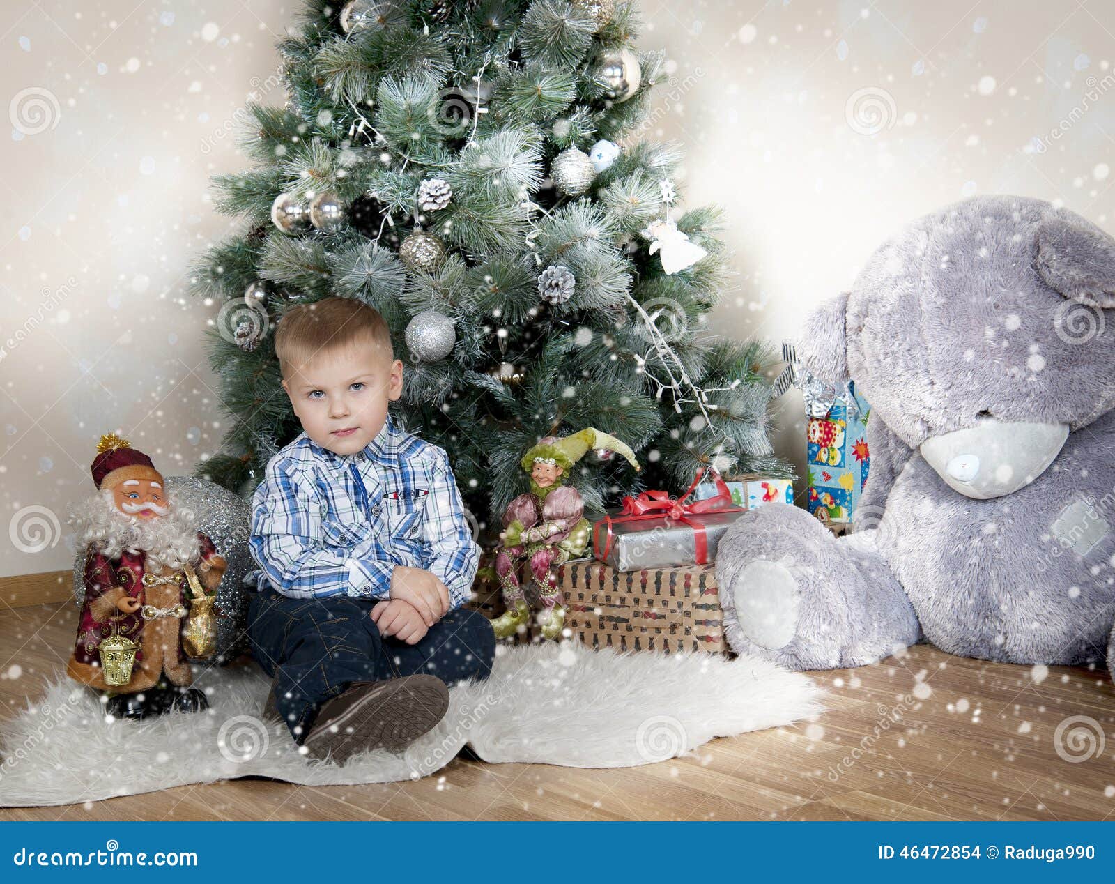 Little boy under the tree stock photo. Image of winter - 46472854