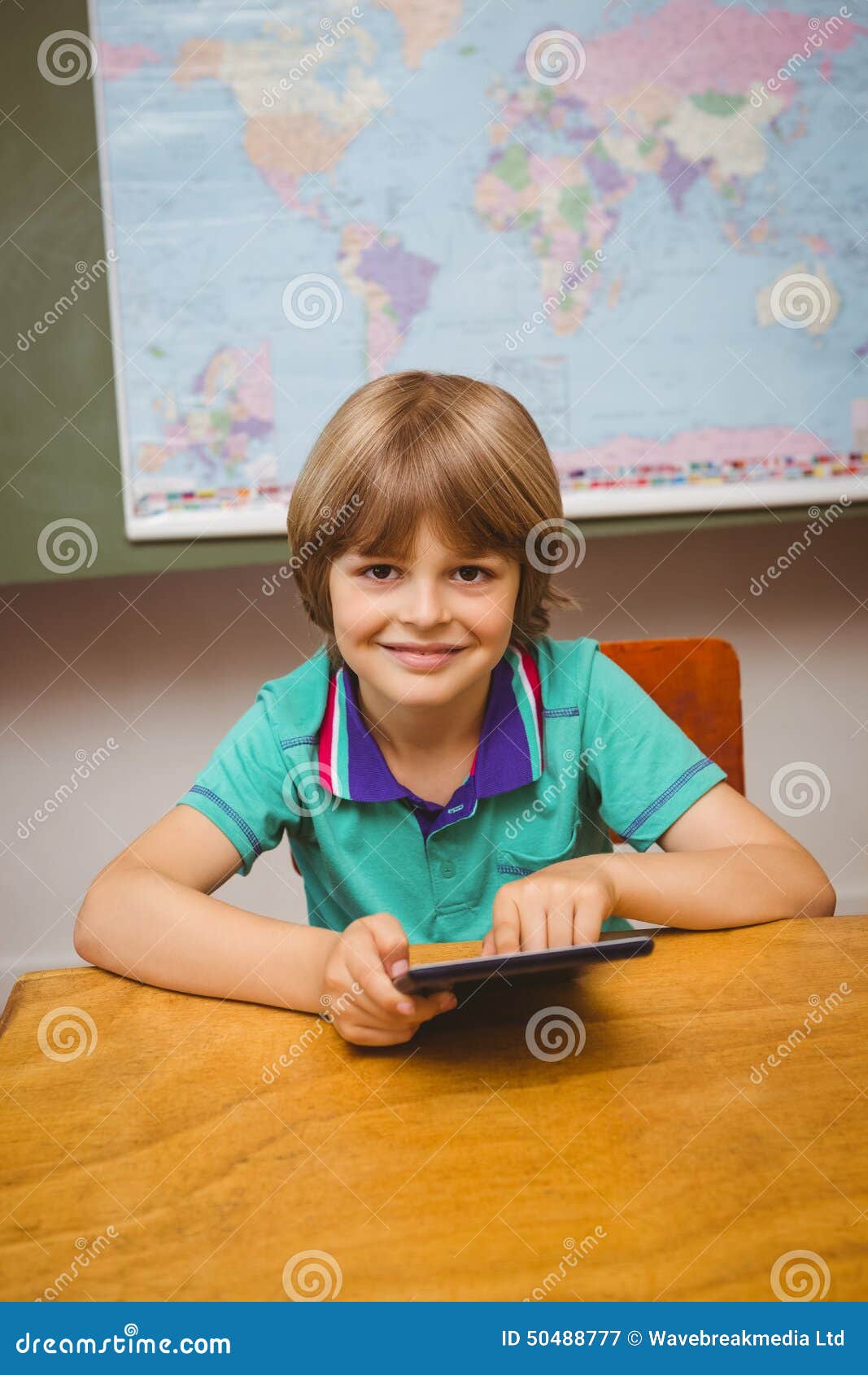 Little Boy Using Digital Tablet in Classroom Stock Image - Image of ...