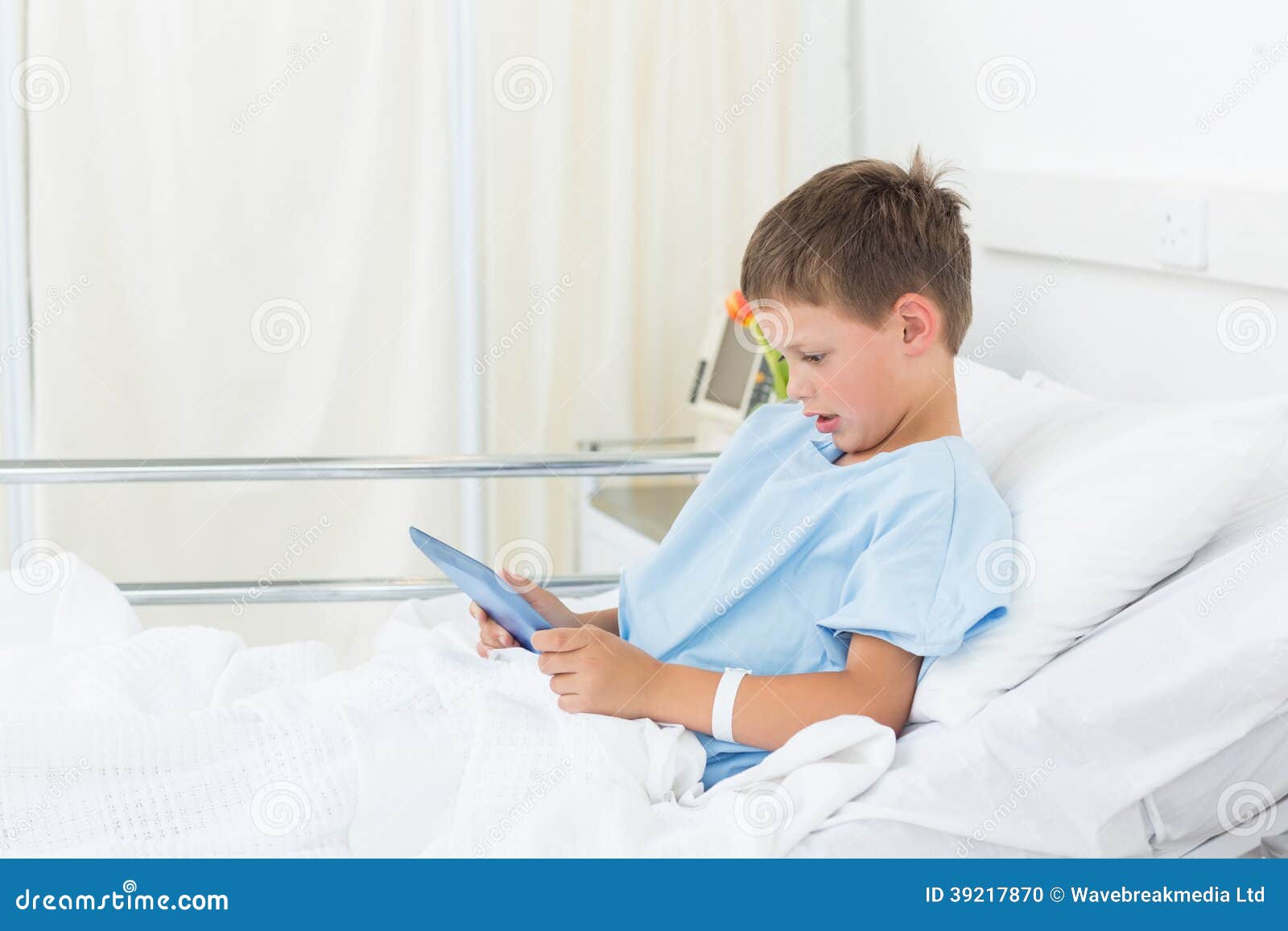 Little Boy Using Digital Tablet in Hospital Stock Photo - Image of ...