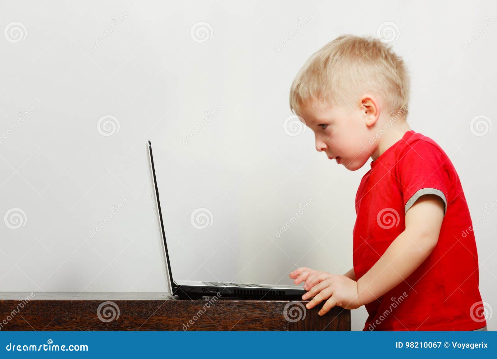 Little Boy Using Laptop Computer Playing Games Stock Image - Image of ...