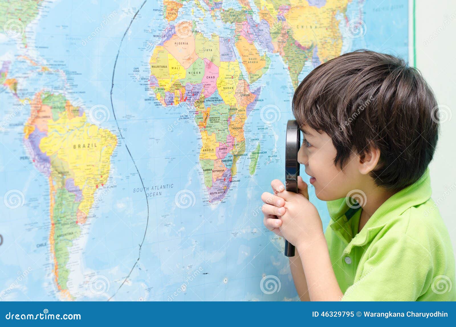 Little Boy Using Magnify Looking Map Photos - Free & Royalty-Free Stock ...