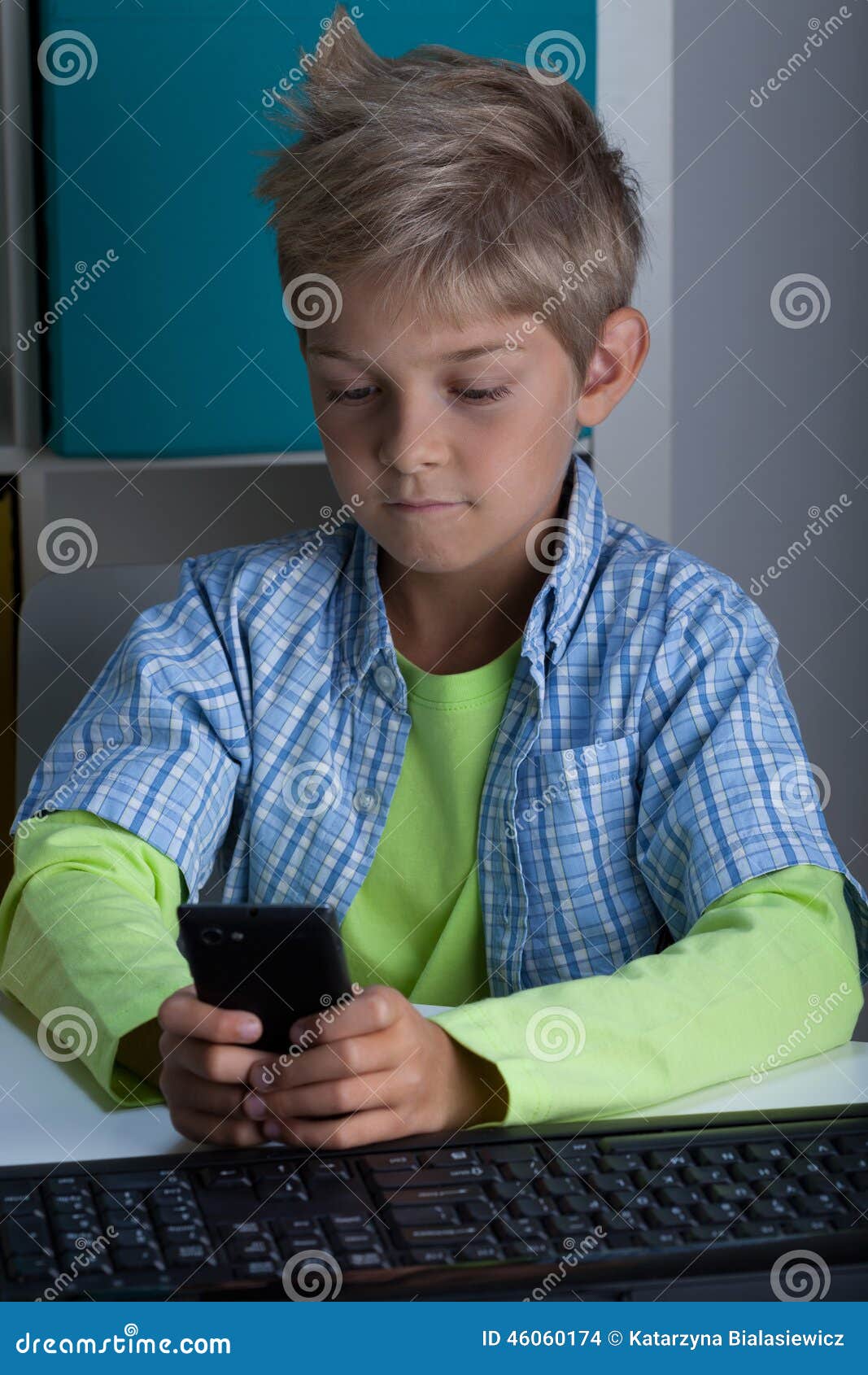 Little Boy Using Smartphone Stock Photo - Image of child, shirt: 46060174
