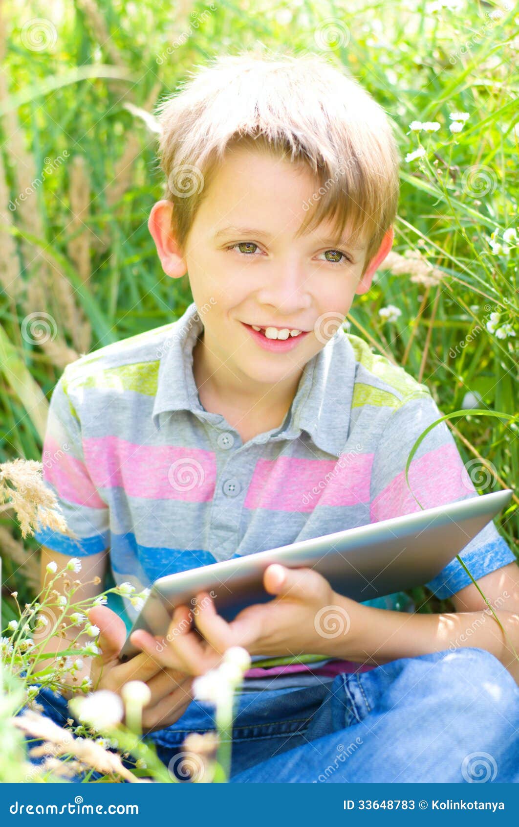 Little boy using tablet stock image. Image of childhood - 33648783