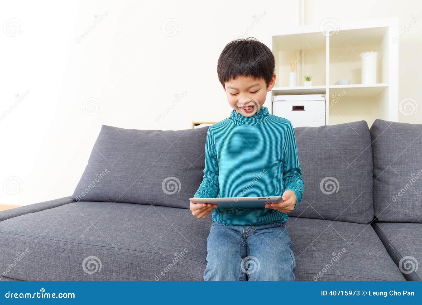 Little boy using tablet stock image. Image of child, looking - 40715973