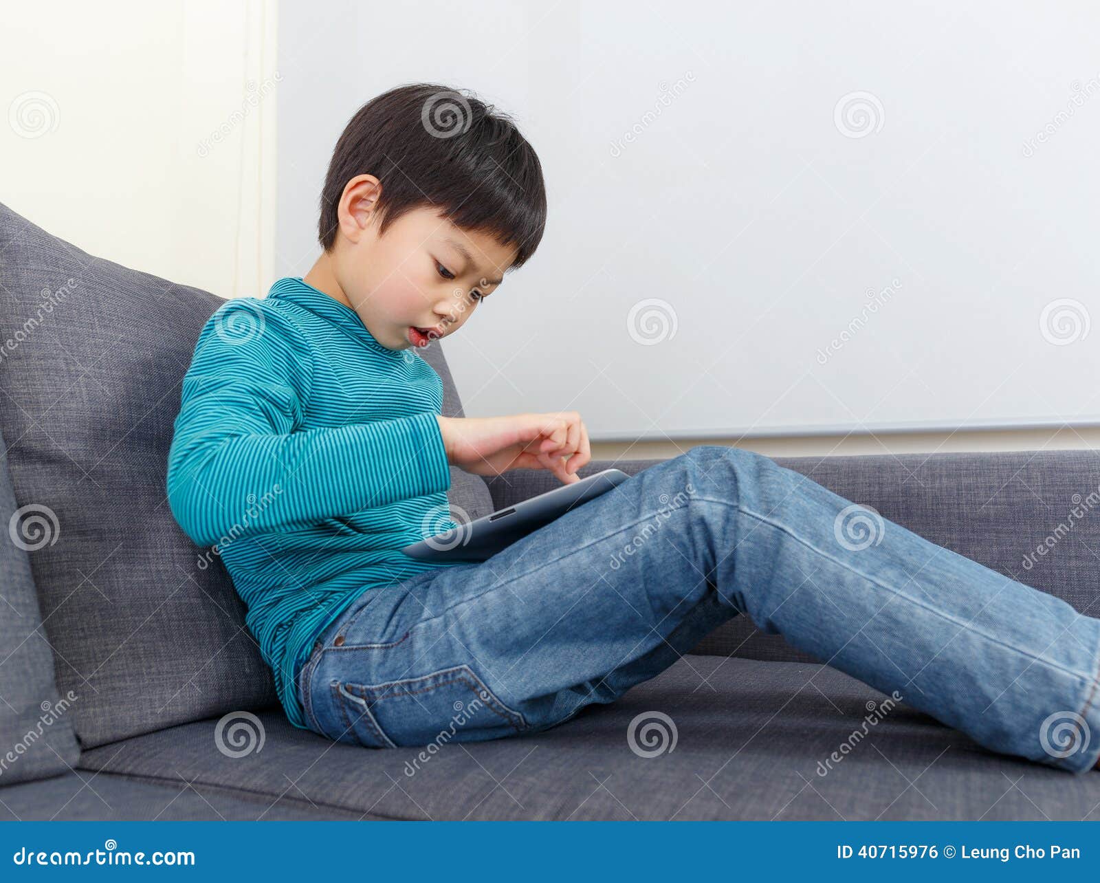 Little boy using tablet stock photo. Image of person - 40715976