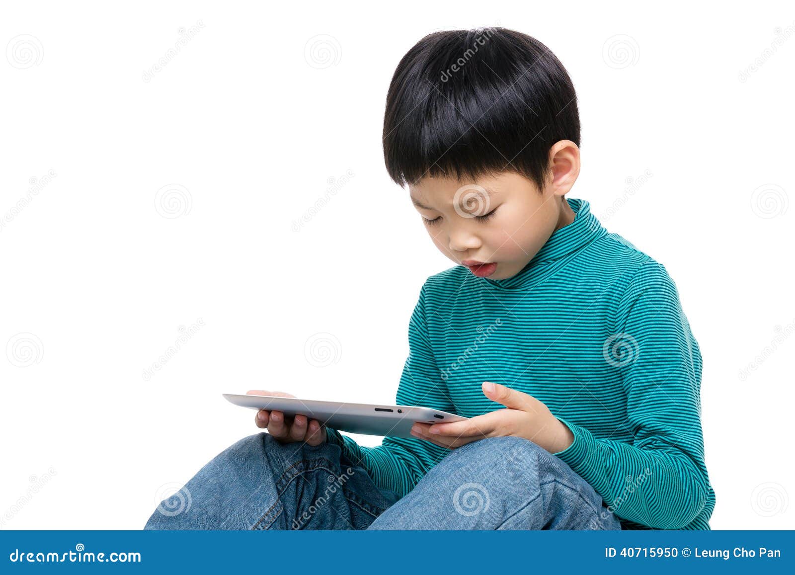 Little boy using tablet stock photo. Image of playing - 40715950