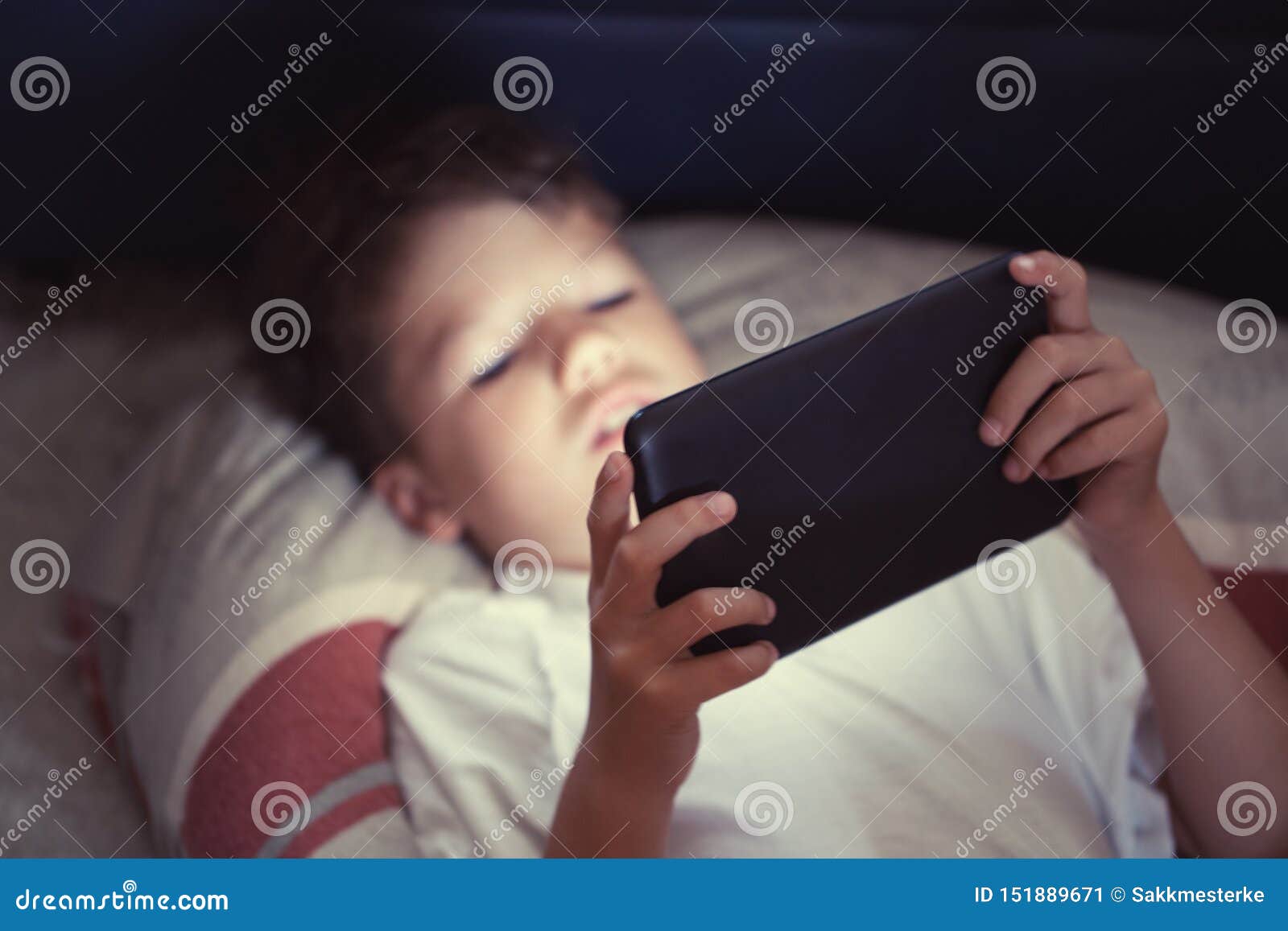 Little Boy Using Tablet at Night in Bedroom Stock Image - Image of ...