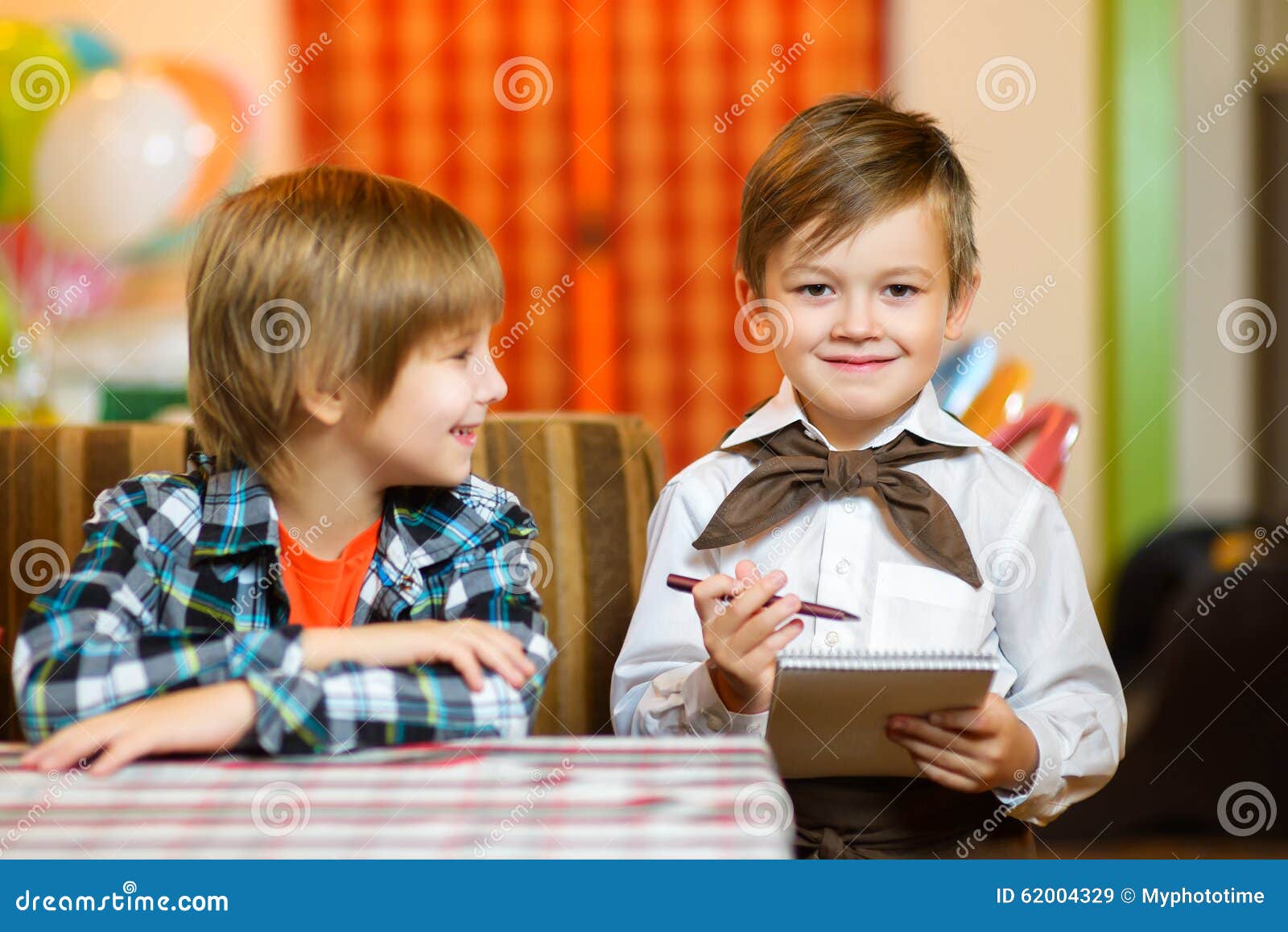 Little Boy Waiter Accepts the Order in a Cafe or Stock Image - Image of ...