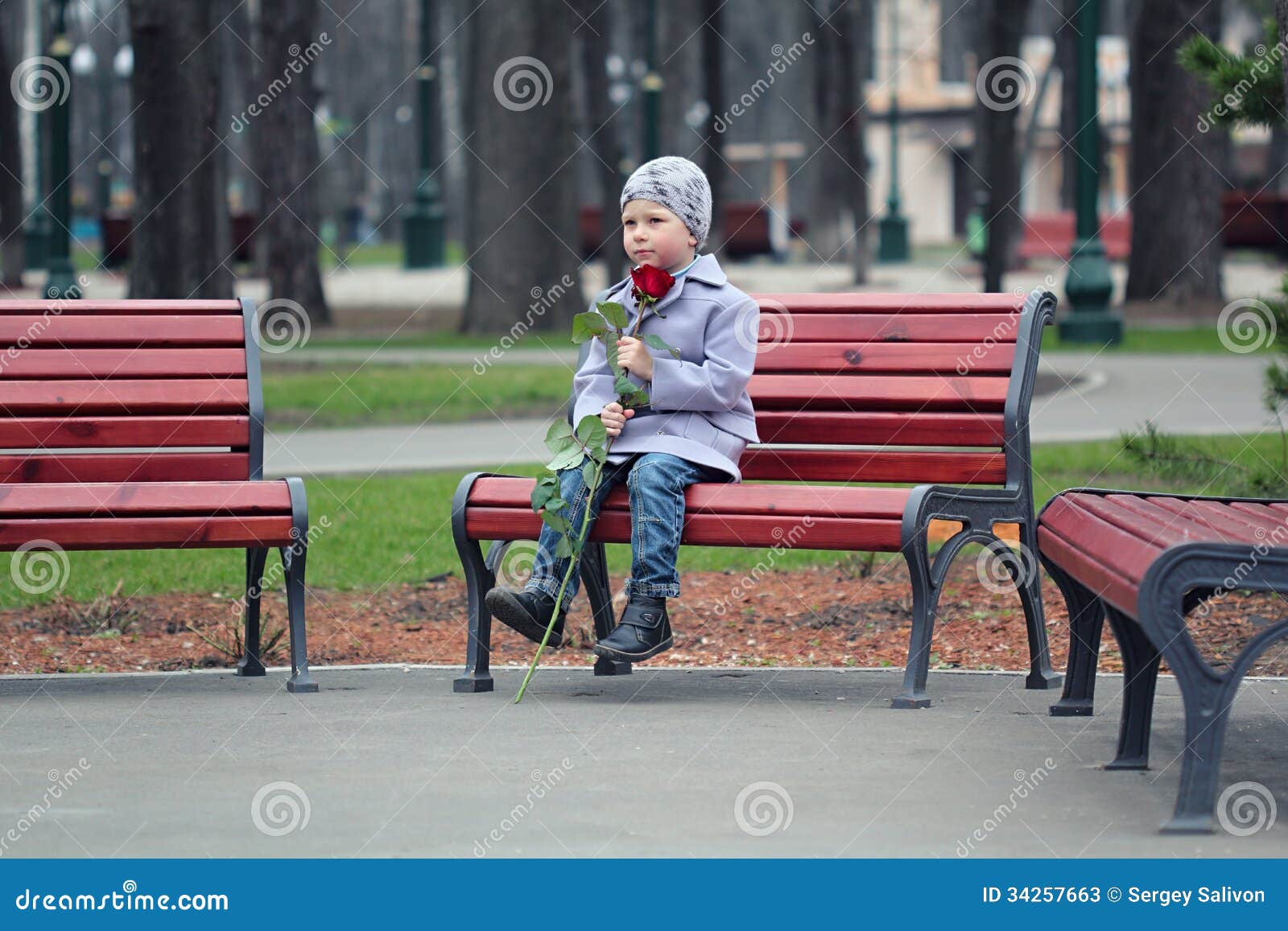 Little Boy Waiting in the Park Stock Image - Image of outdoor, coat ...