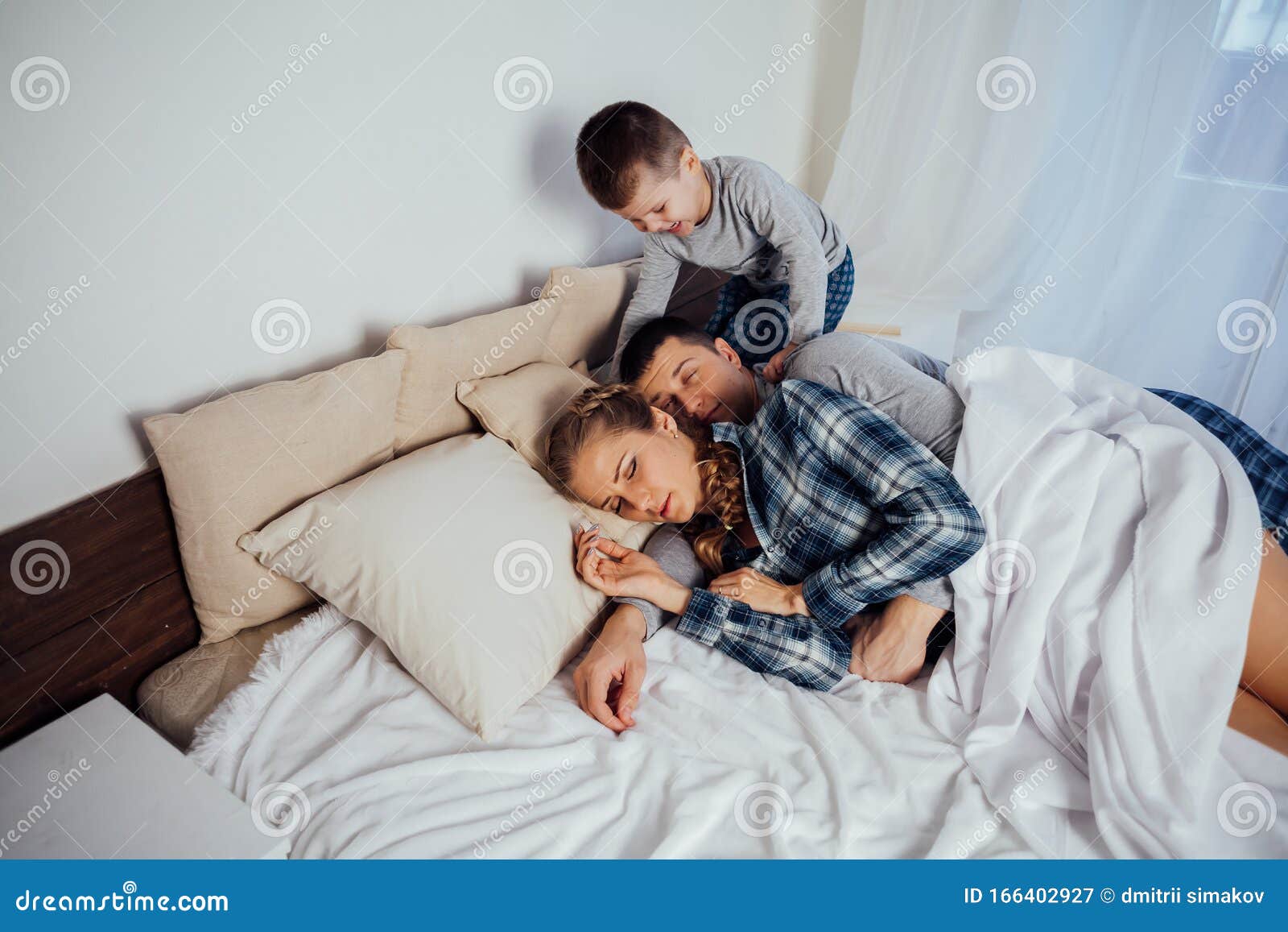 Little Boy Wakes Up in the Morning, Parents Stock Image - Image of ...