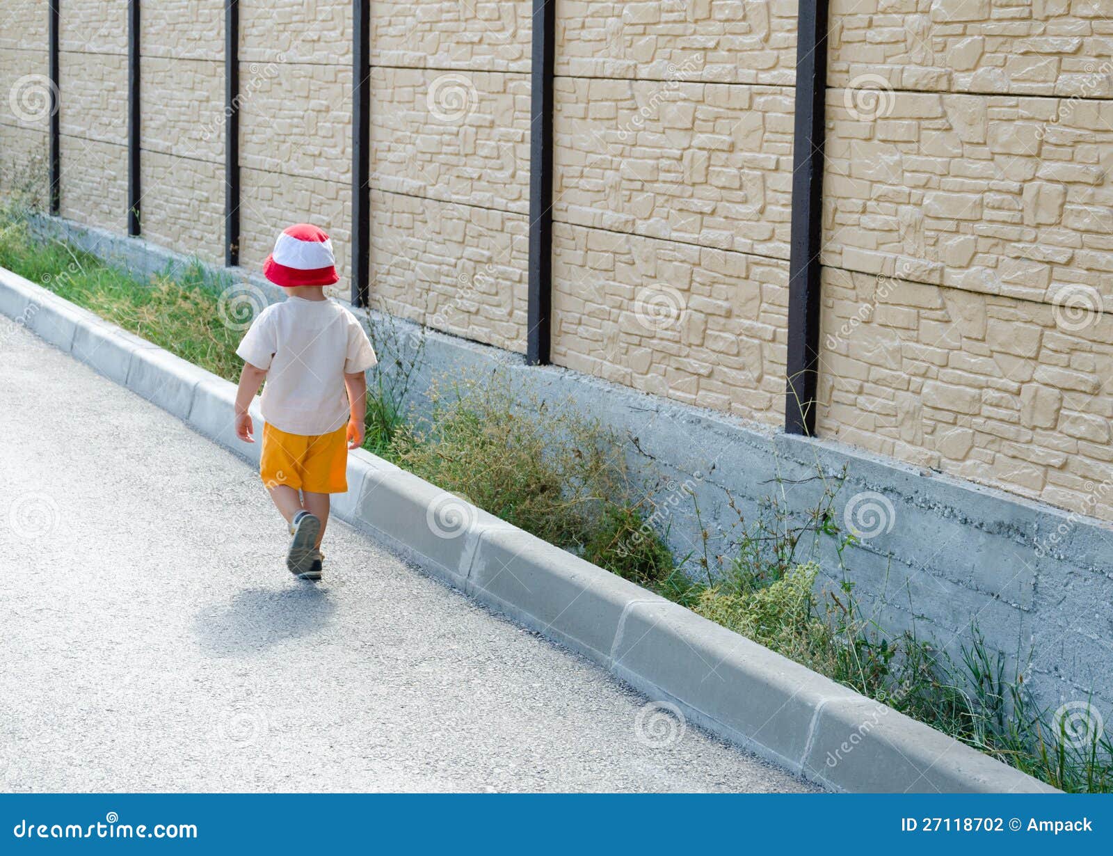Little boy walking away stock photo. Image of sunhat - 27118702