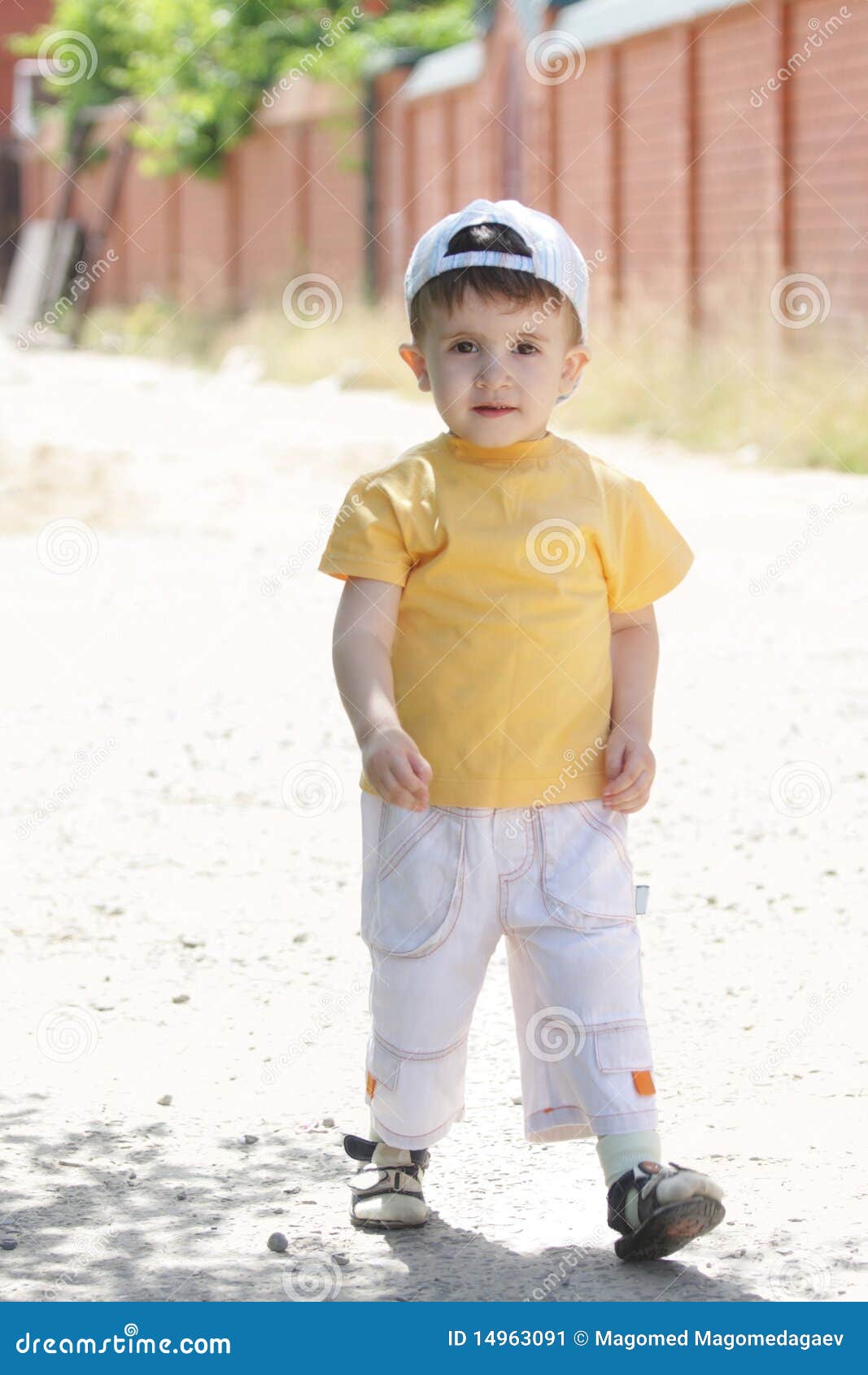 Little Boy Walking Outdoors Stock Image - Image of walking, motion ...