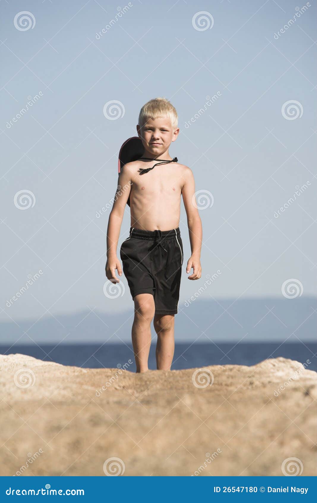 Little Boy Walks in Black Short, Next To the Sea Stock Photo - Image of ...