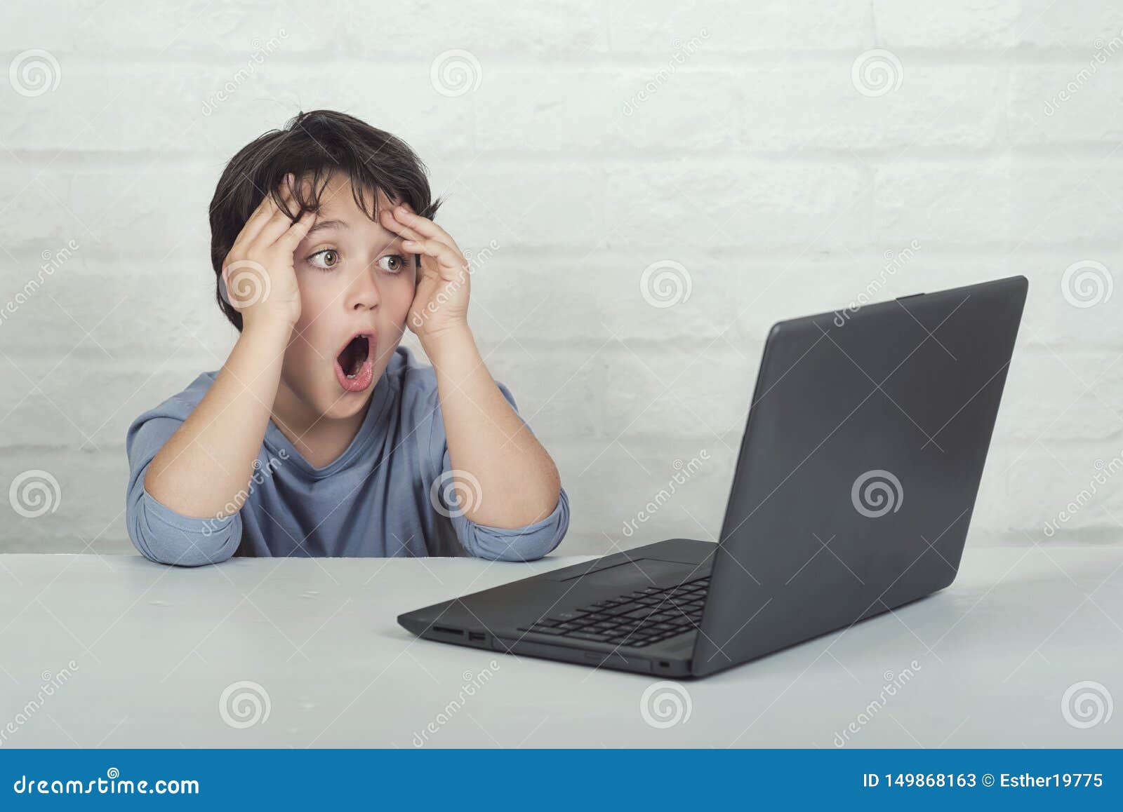 Little Boy Watching Inappropriate Content on Laptop Computer Stock ...