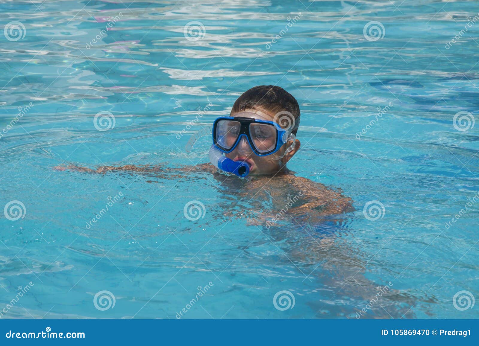 The Little Boy in the Water with Diving Equipment Stock Photo - Image ...