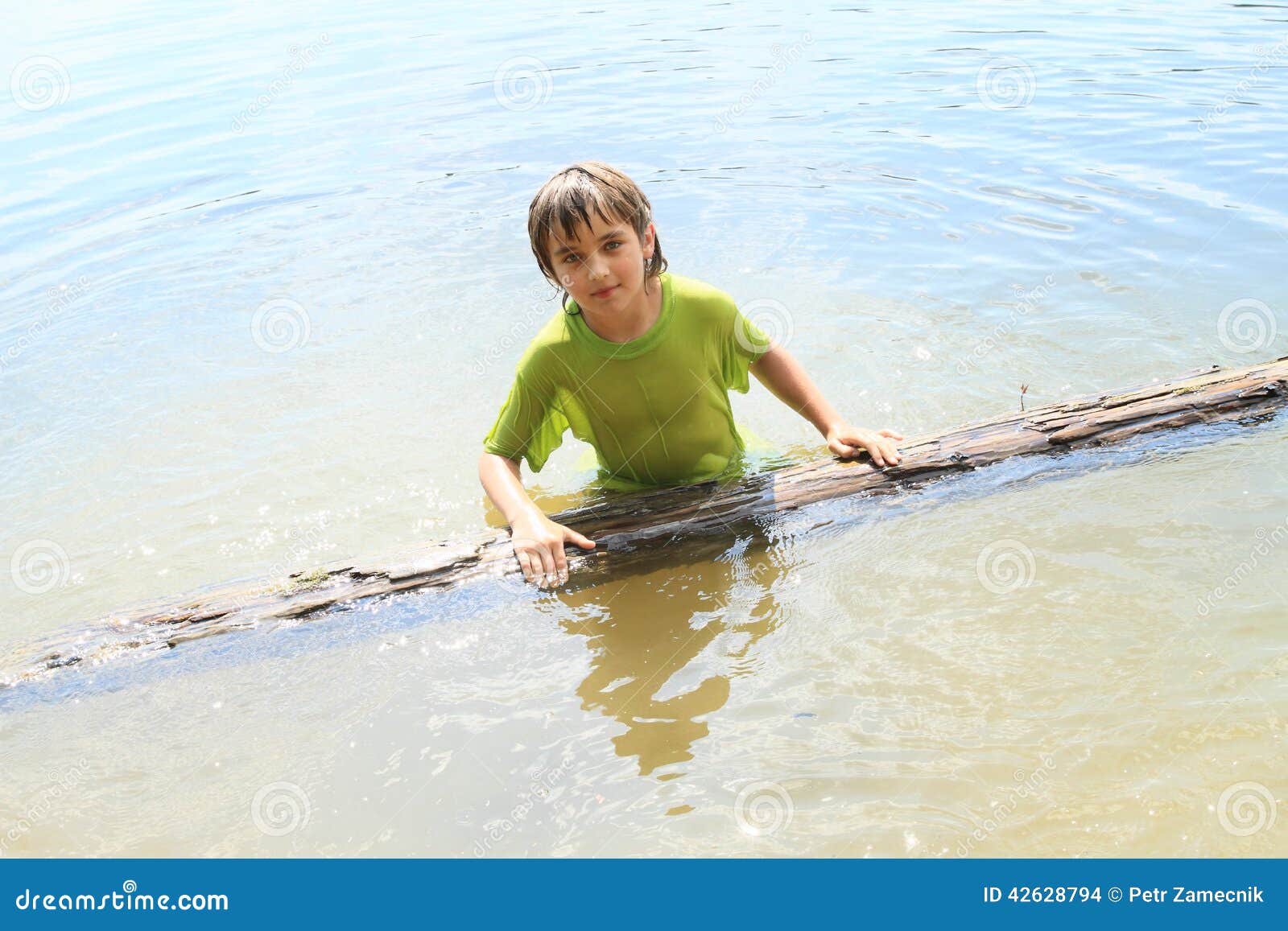 Little Boy in Water with Trunk Stock Photo - Image of little, enjoying ...