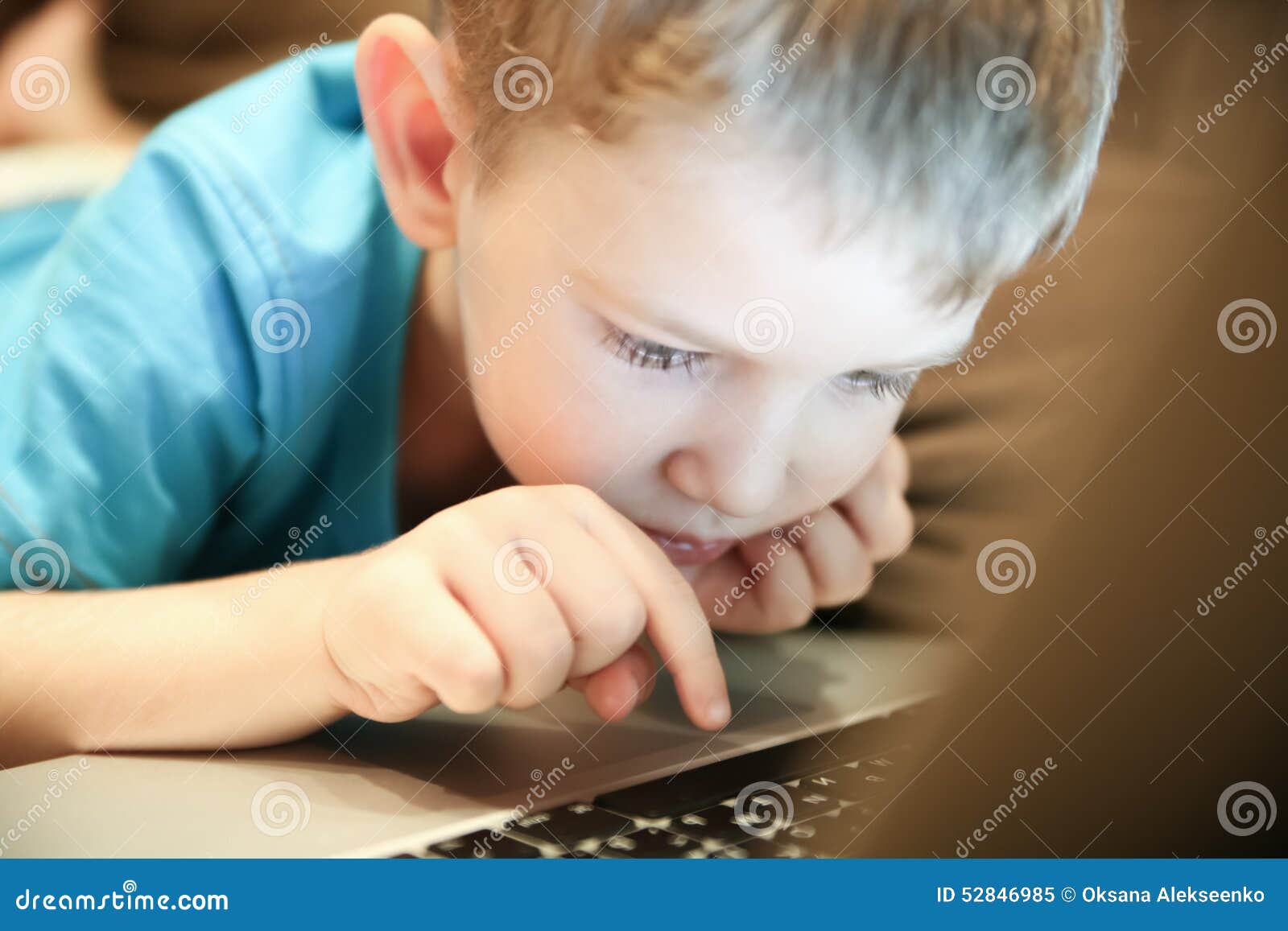 Little Boy Working on Notebook Stock Image - Image of home, child: 52846985