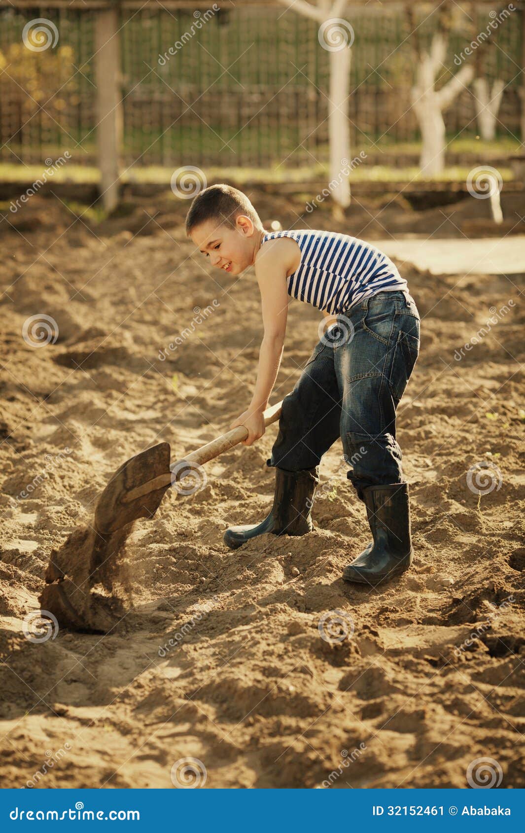 Little Boy Working with Shovel in Garden Stock Image - Image of field ...