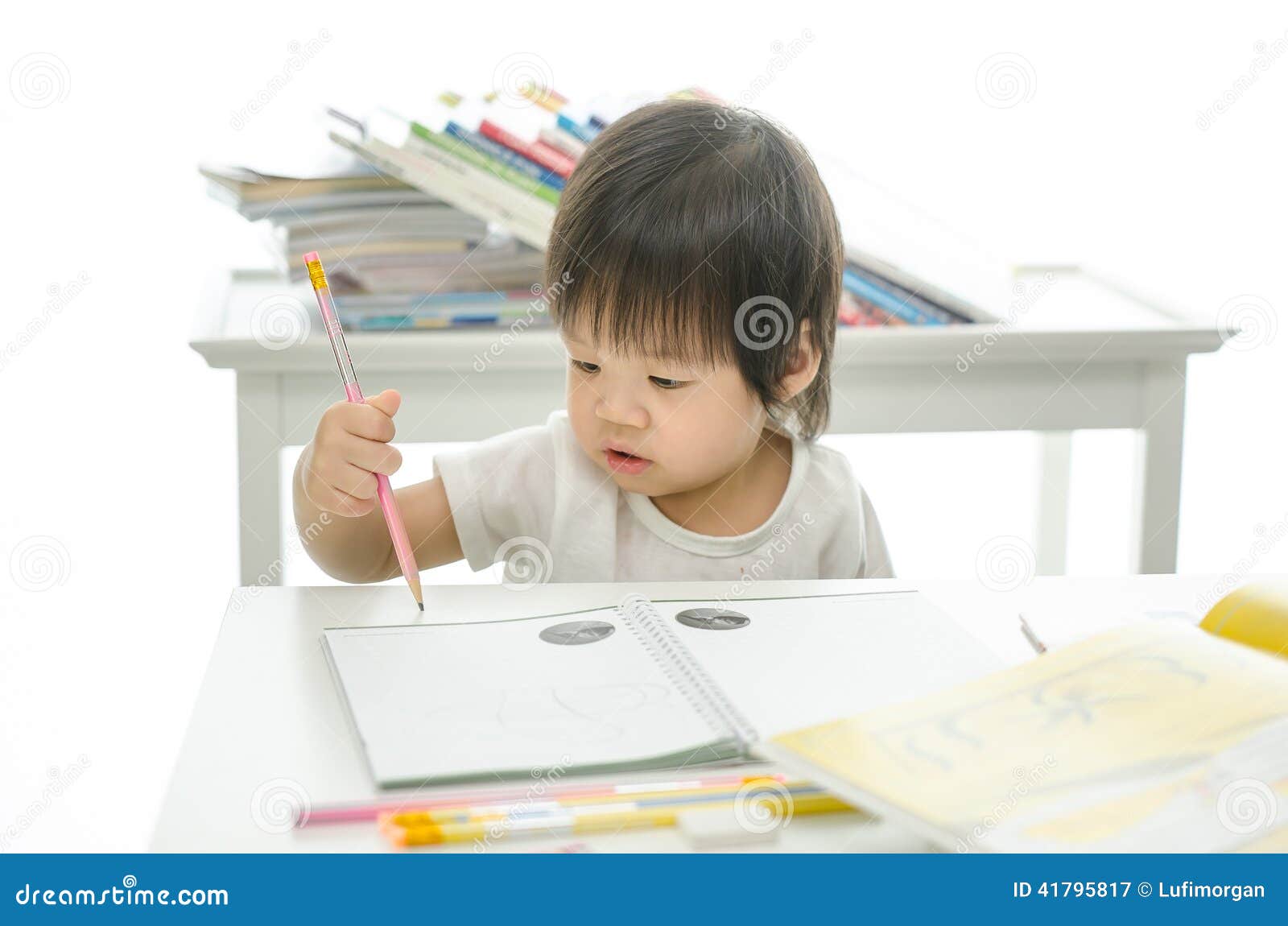 Little boy is writing stock image. Image of beautiful - 41795817