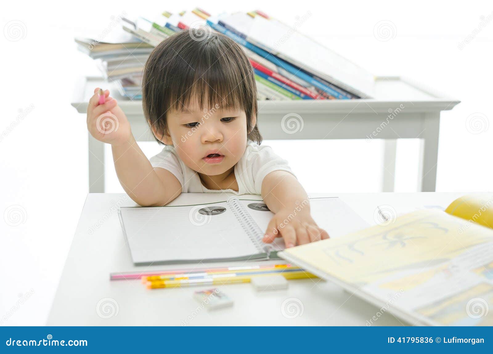 Little boy is writing stock photo. Image of beauty, crayon - 41795836